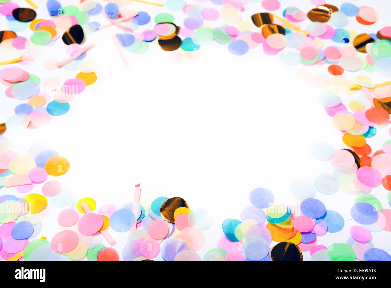 Close-up of colorful confetti as a border frame Stock Photo - Alamy