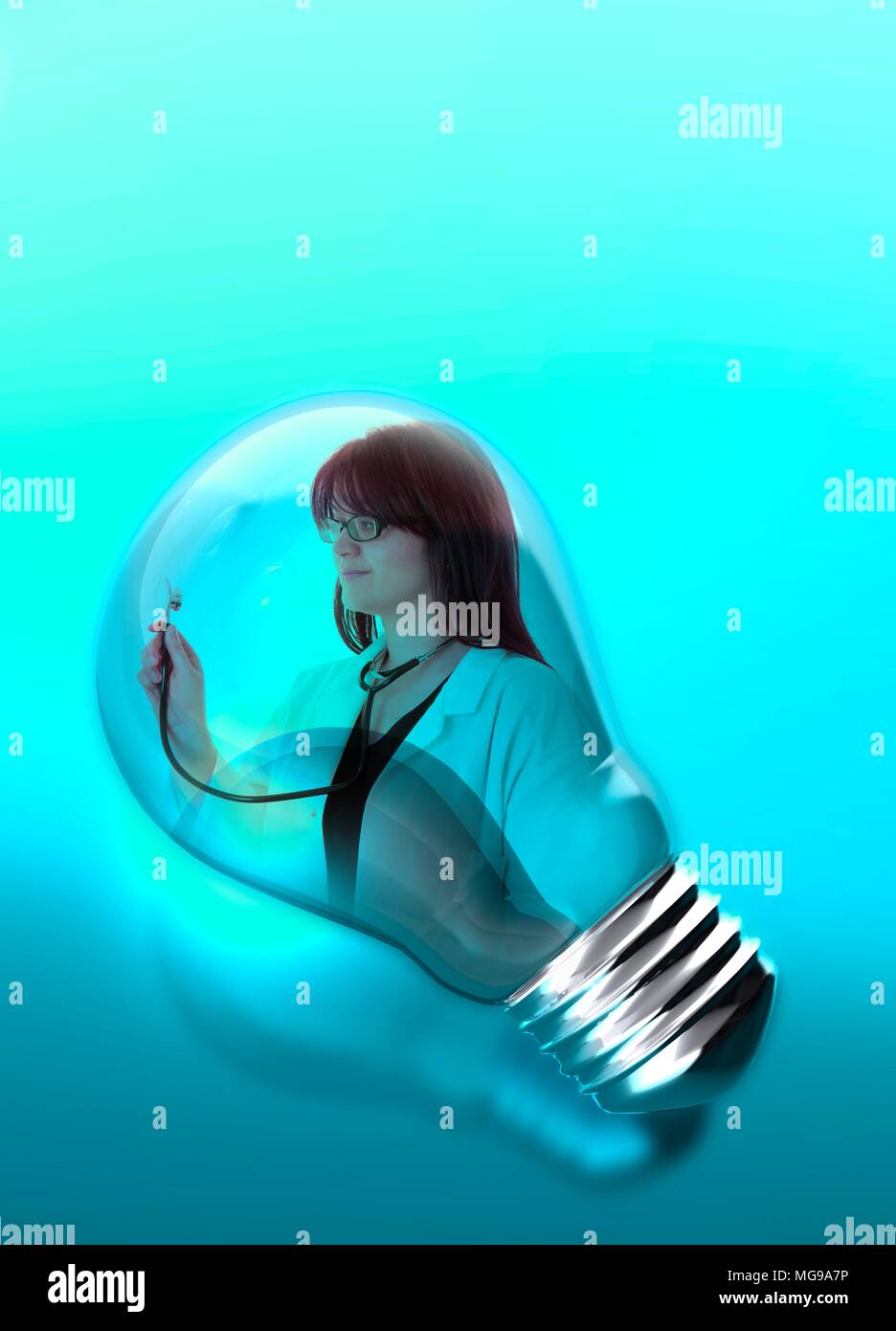 Female doctor with stethoscope in lightbulb Stock Photo - Alamy