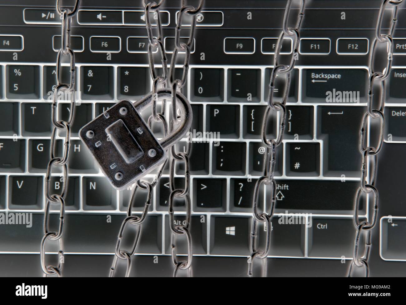 Computer keyboard with metal chains and padlock Stock Photo - Alamy