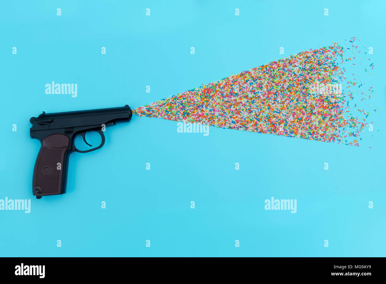 Pistol shooting sweets Stock Photo - Alamy