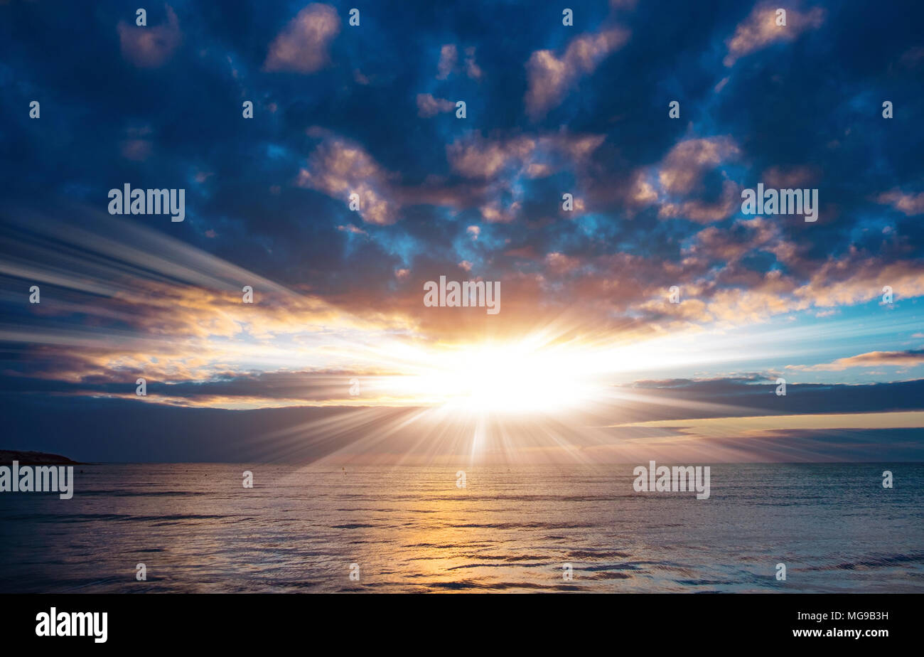 Sunset over sea Stock Photo - Alamy