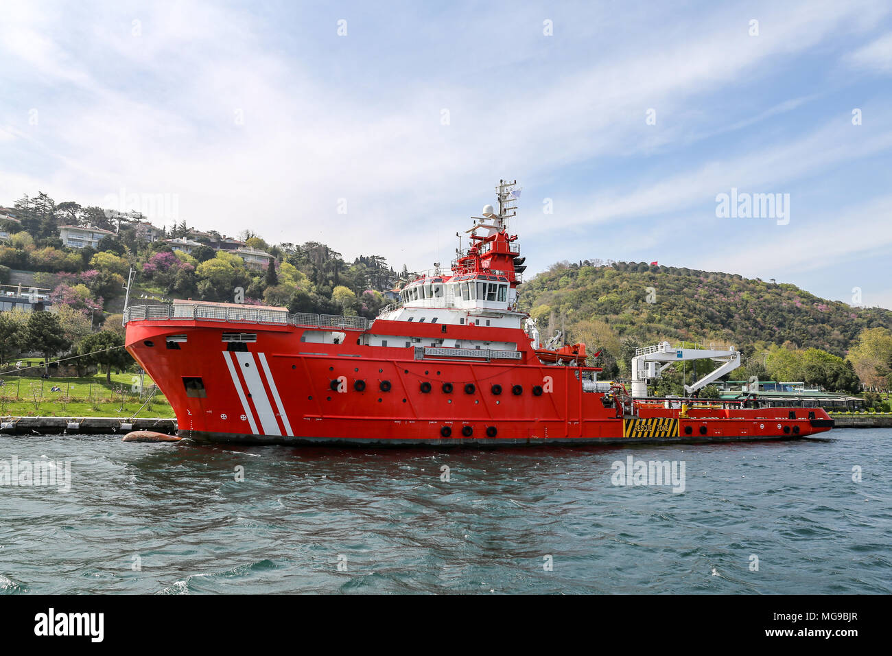 An Orange Coastal Safety Boat waiting in Shore Stock Photo - Alamy