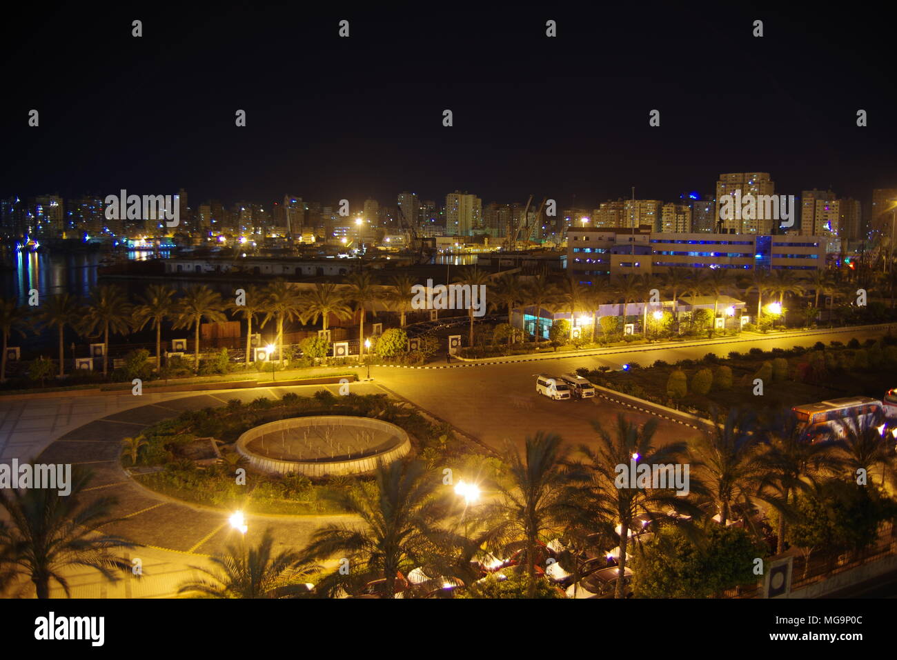 Alexandria by night from port Stock Photo - Alamy