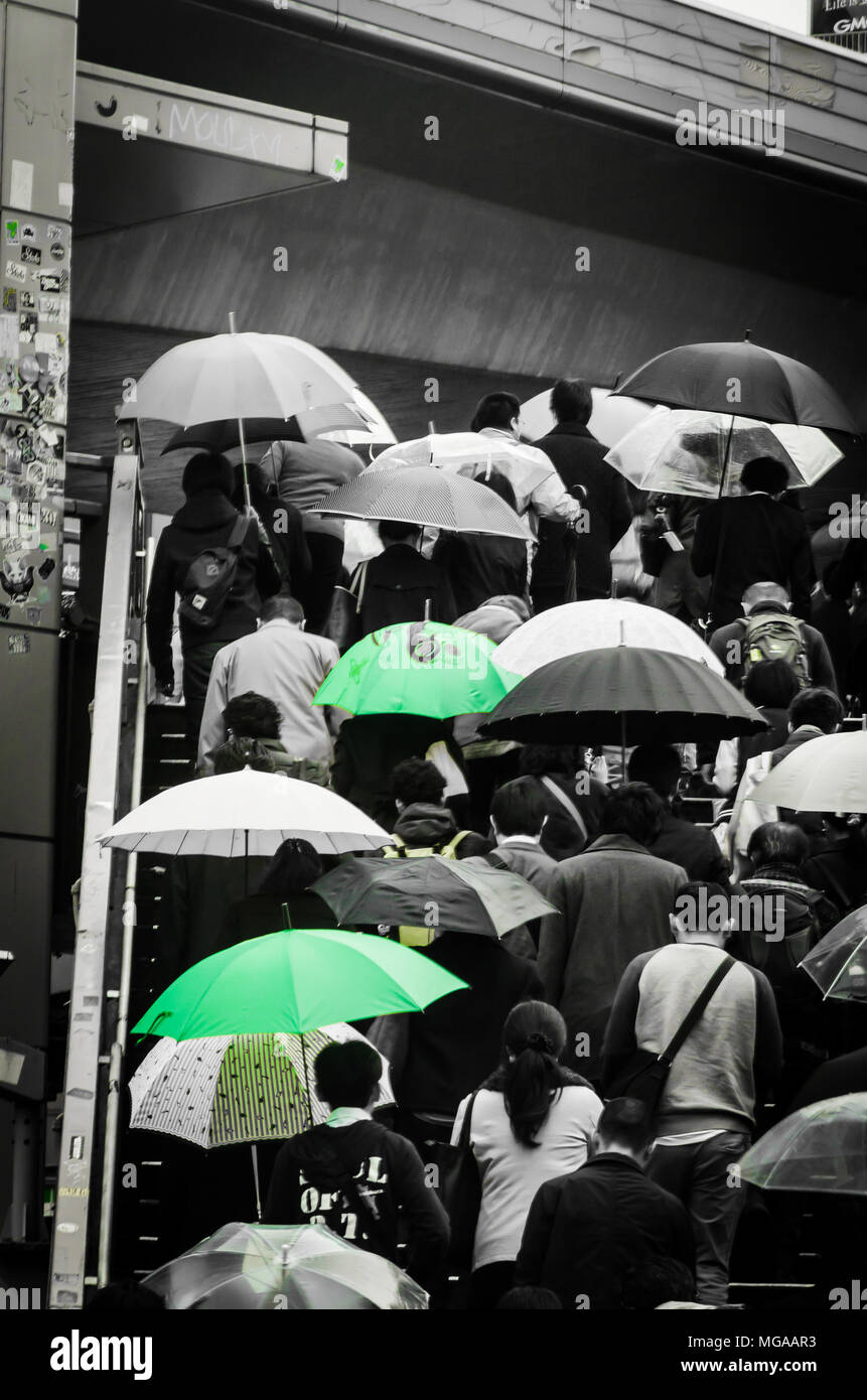 Morning office rush hour with rain and umbrella in Tokyo Stock Photo ...