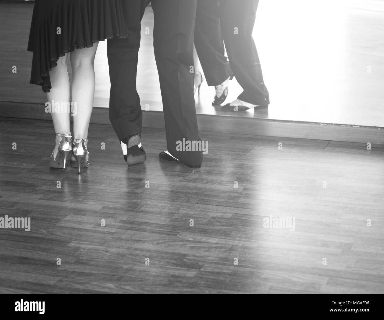 Ballroom dance couple of dancers and teachers in studio school dancing ...