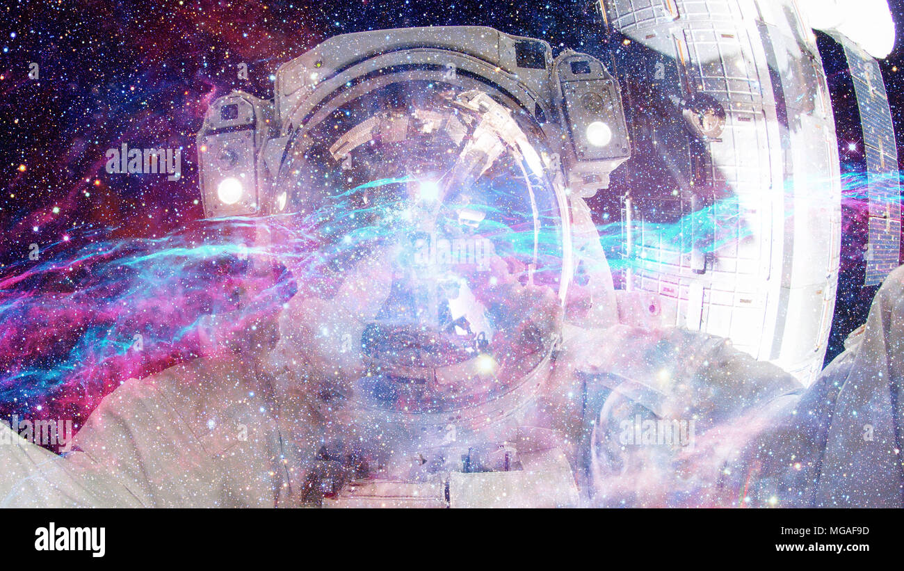 Astronaut in outer space. Science fiction art. Elements of this image ...