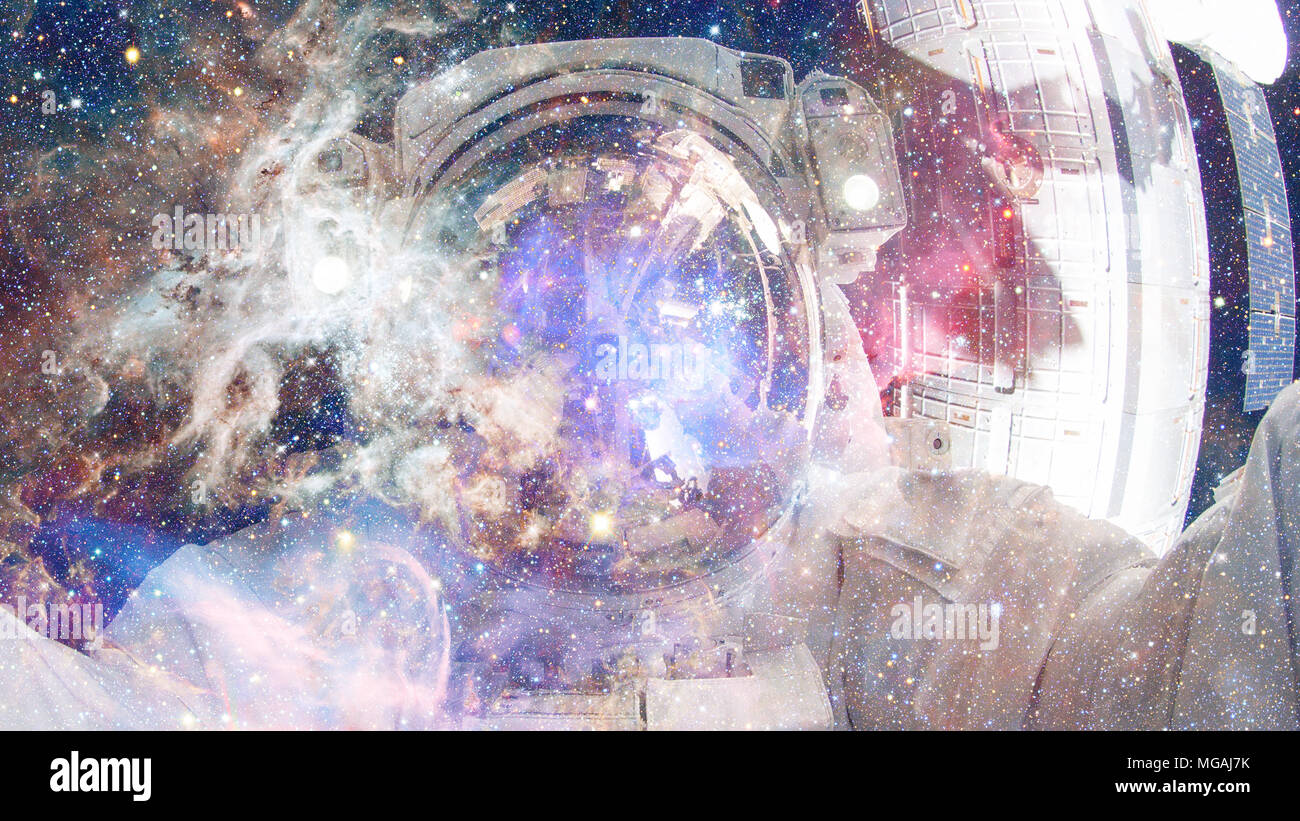 Astronaut in outer space. Science fiction art. Elements of this image ...