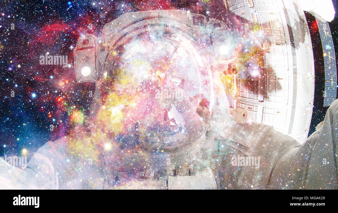 Astronaut in outer space. Science fiction art. Elements of this image ...