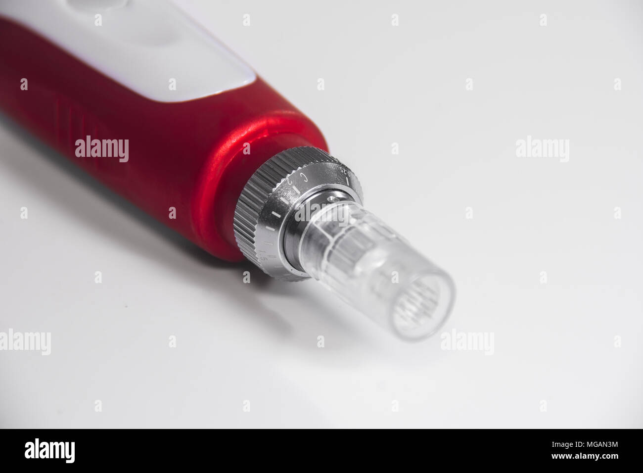 Electronic device with needles to remove skin imperfections Stock Photo ...