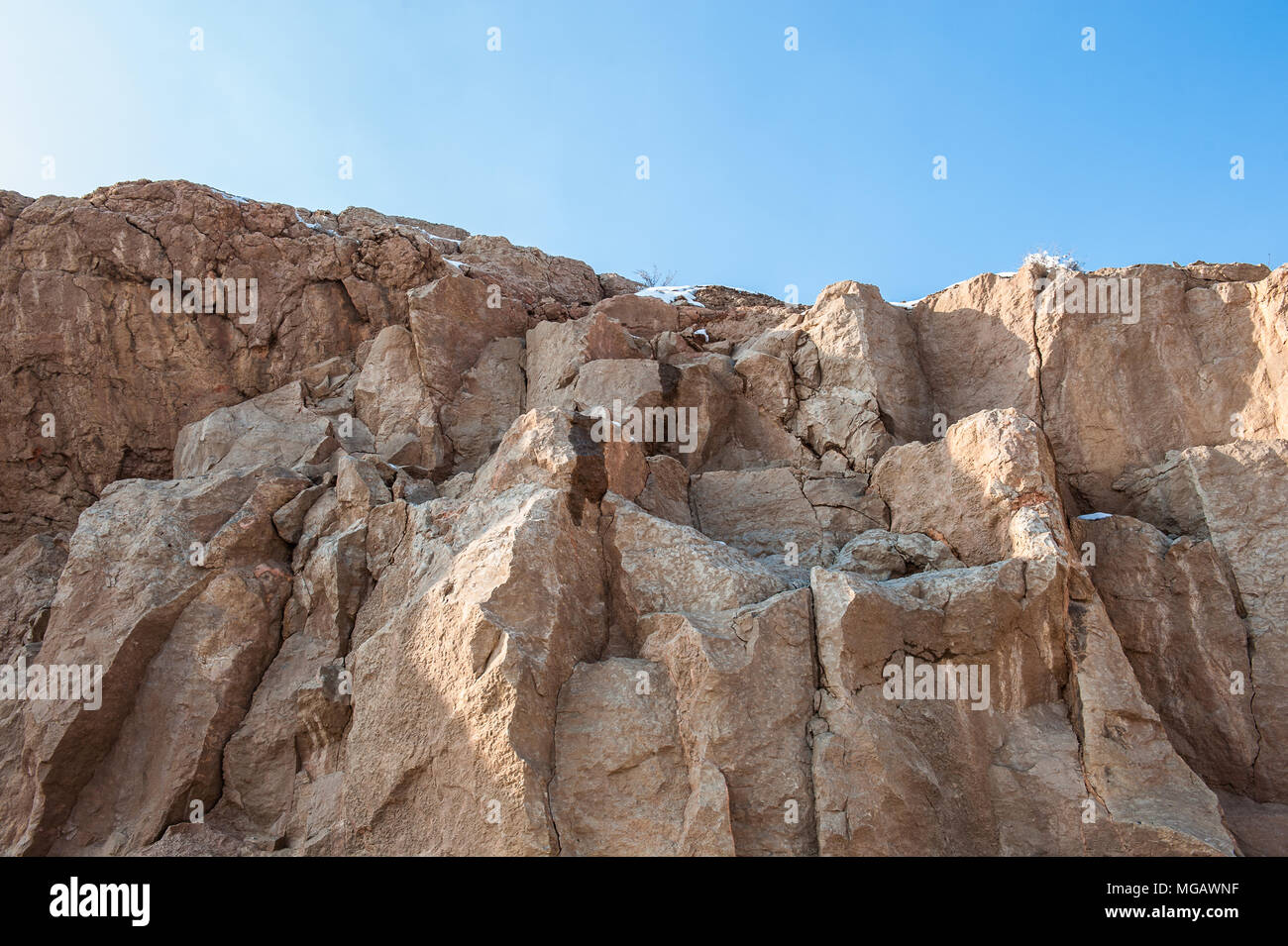 Rock in winter in Iran Stock Photo - Alamy