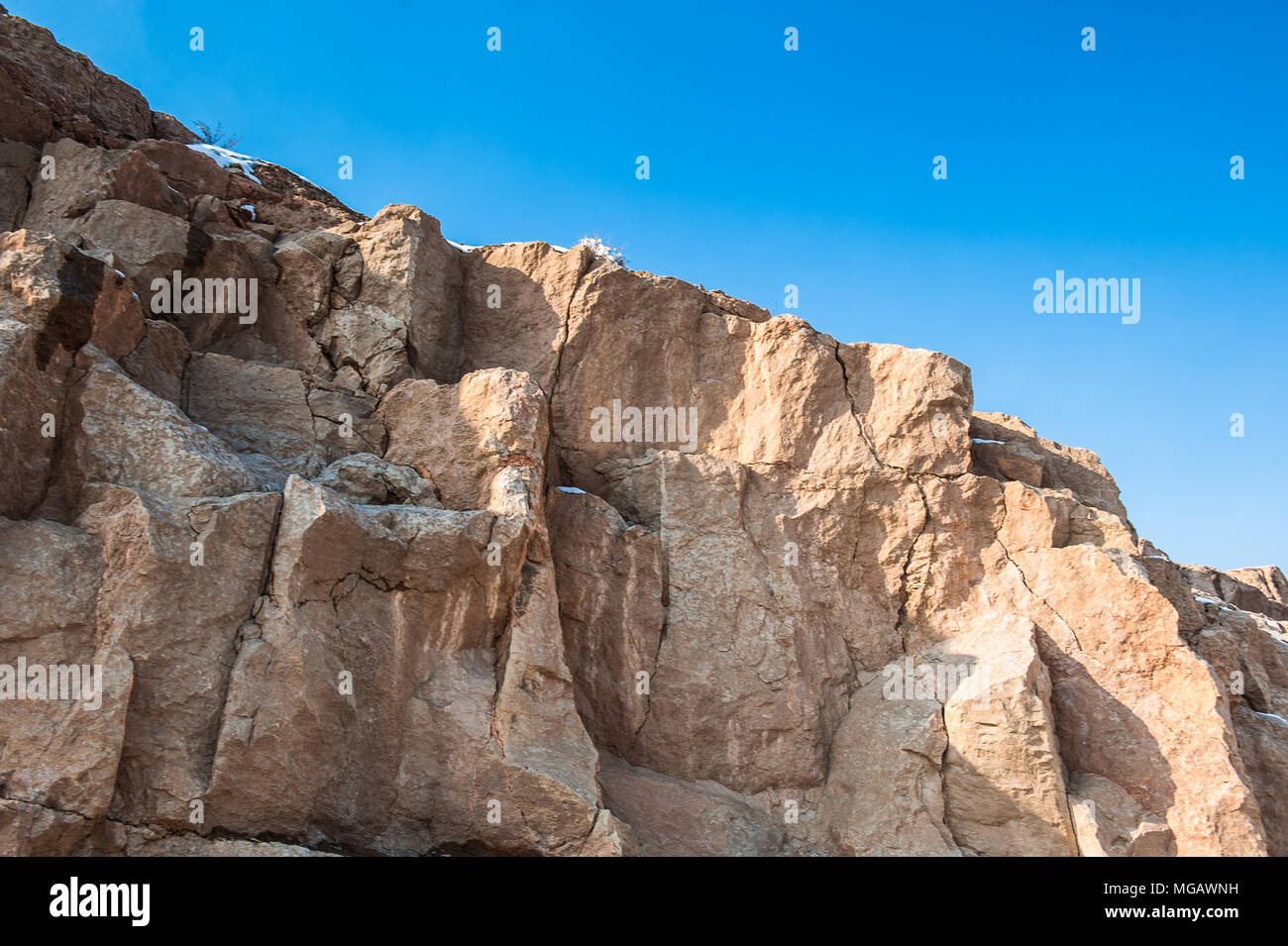 Rock in winter in Iran Stock Photo - Alamy
