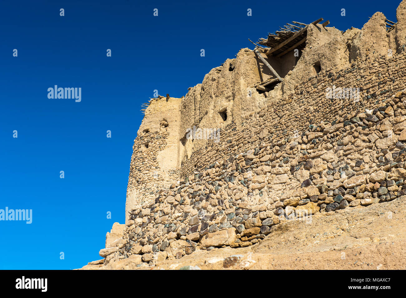 Fortress on a rock in a village in an Iranian province Stock Photo - Alamy
