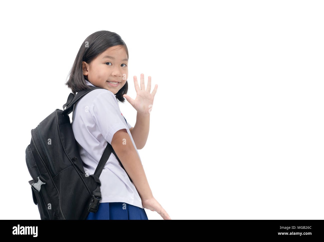 Asian girl student going to school and waving goodbye isolated on white ...