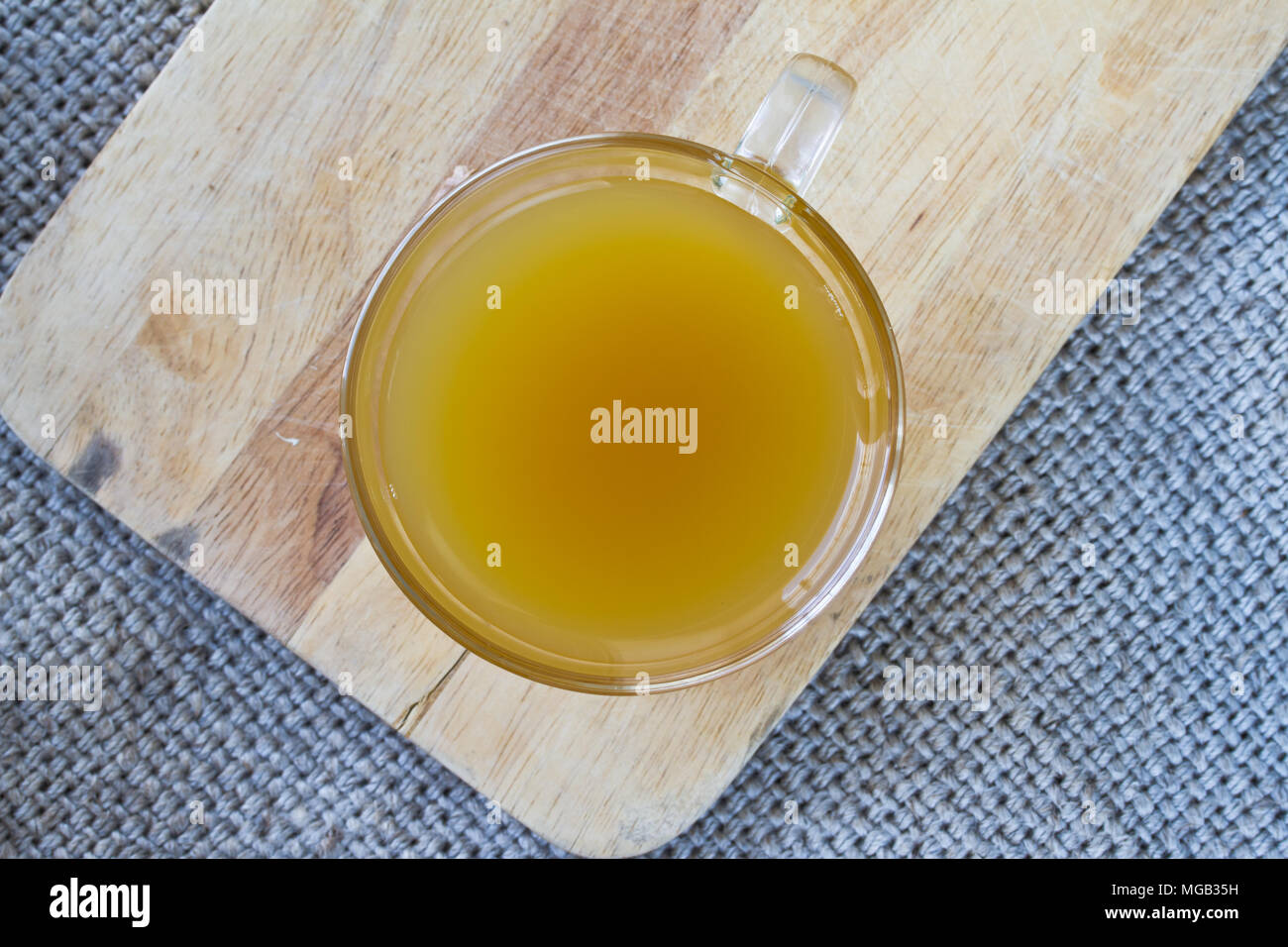 Ginger tea in a transparent cup. Top view Stock Photo - Alamy