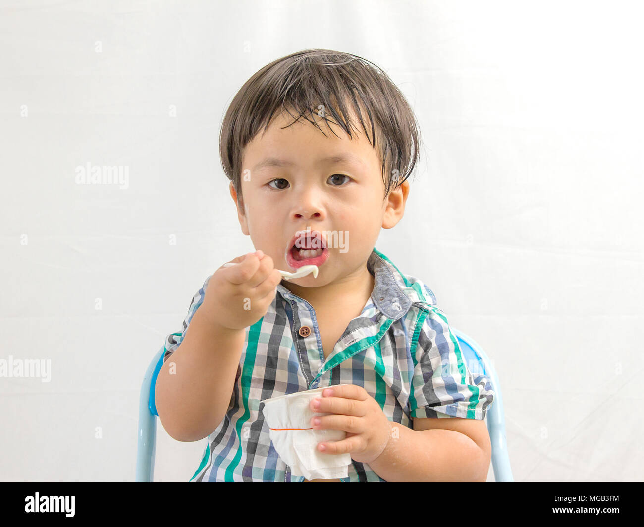 Yogurt child hi-res stock photography and images - Alamy