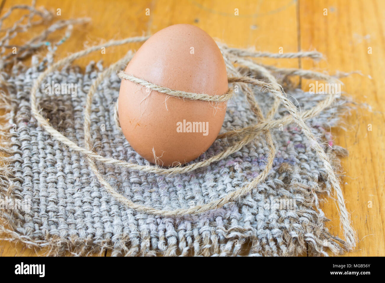 Egg rope around on sack Stock Photo - Alamy