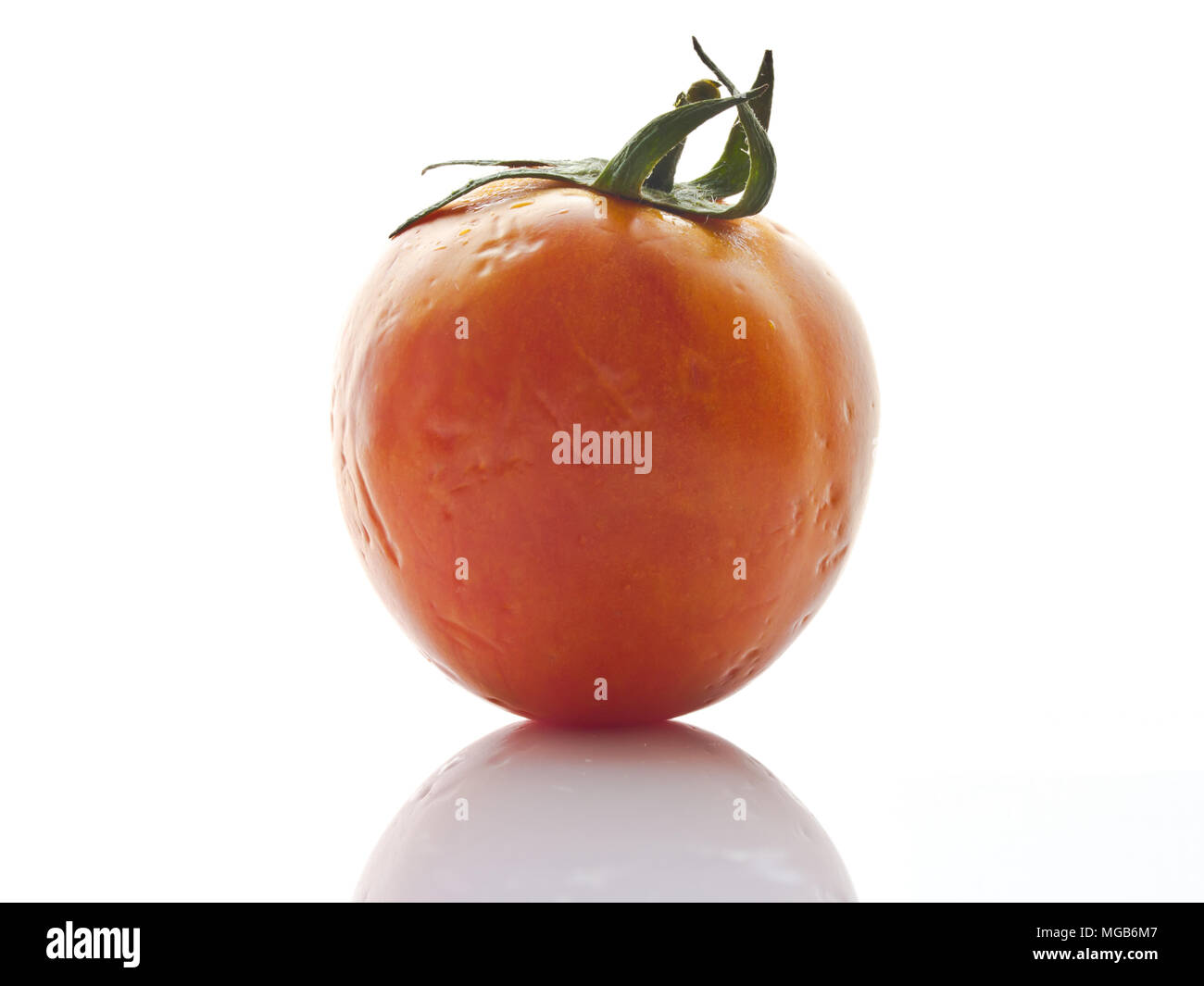 Single Juicy tomato with Isolated on white background Stock Photo - Alamy