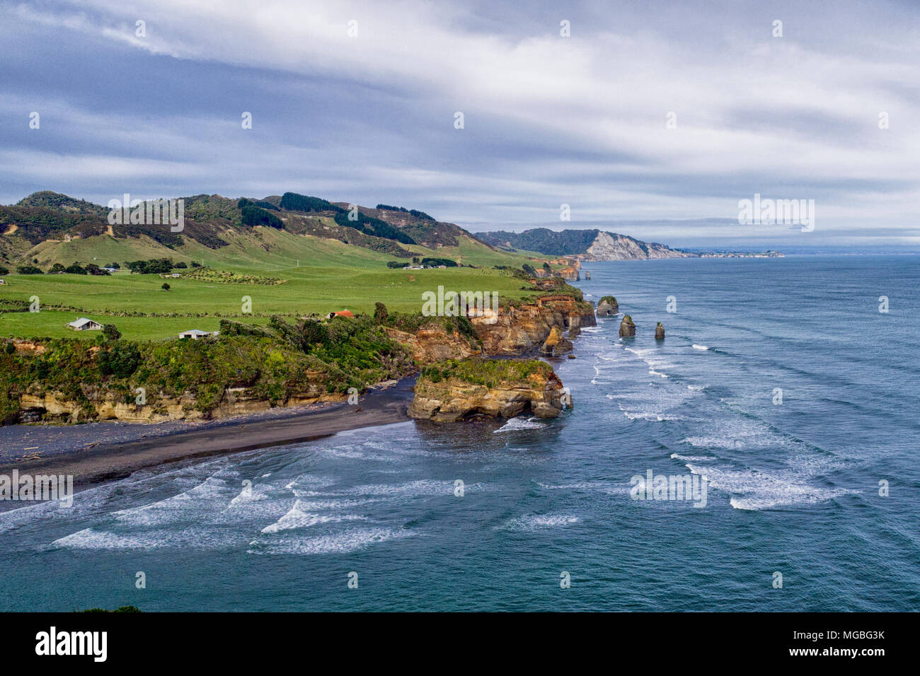 Taranaki Coast, three Sisters and Elephant rock. The top of Mount ...