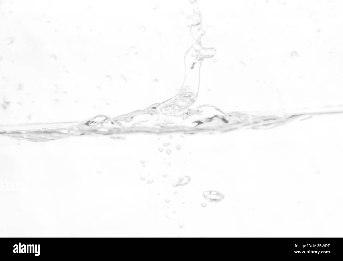 Drops water falling on white Black and White Stock Photos & Images - Alamy