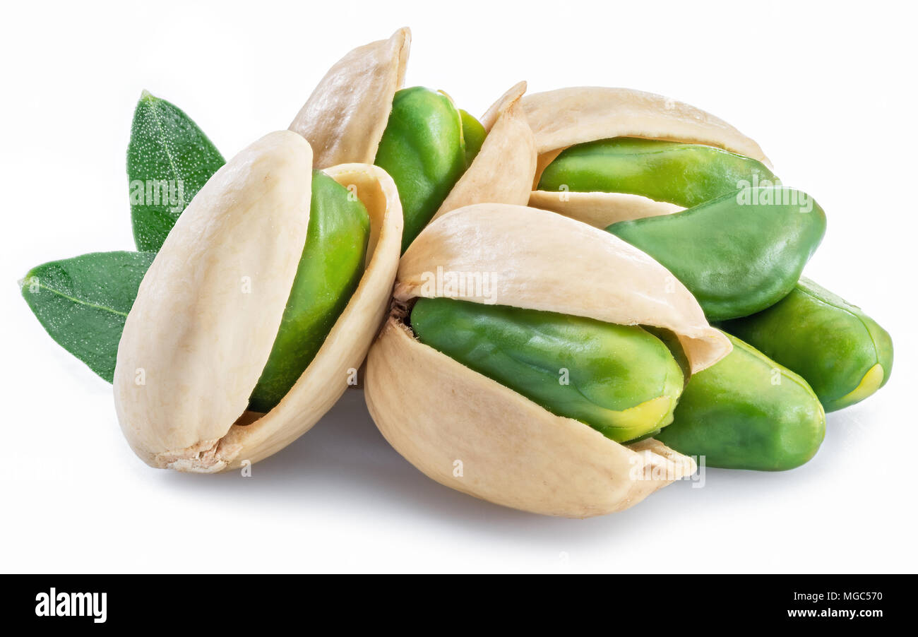 Green pistachio nuts with pistachio shell on white background Stock ...