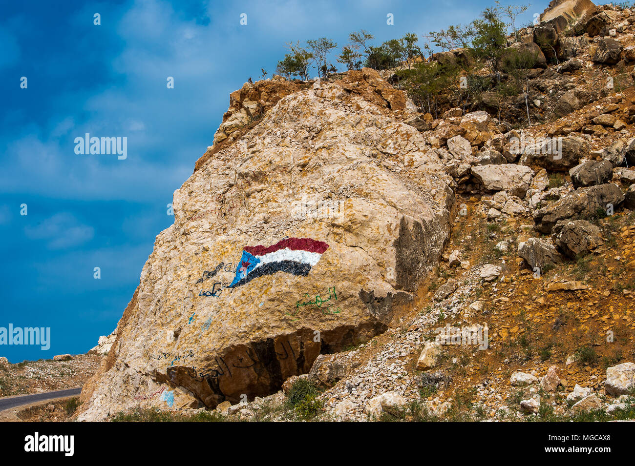 Yemen National Flag on the rock of the Socotra Island Stock Photo - Alamy