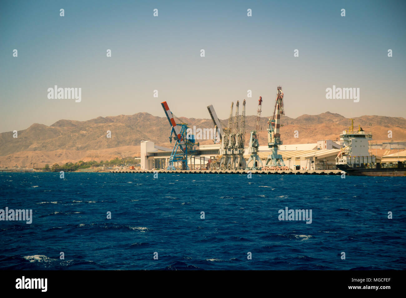 Port of Eilat, Israel. A cargo ship docked in the port Stock Photo - Alamy