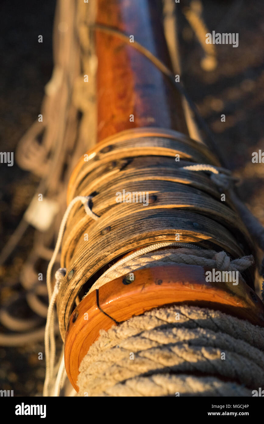 Wooden mast on a small sailing boat Stock Photo - Alamy