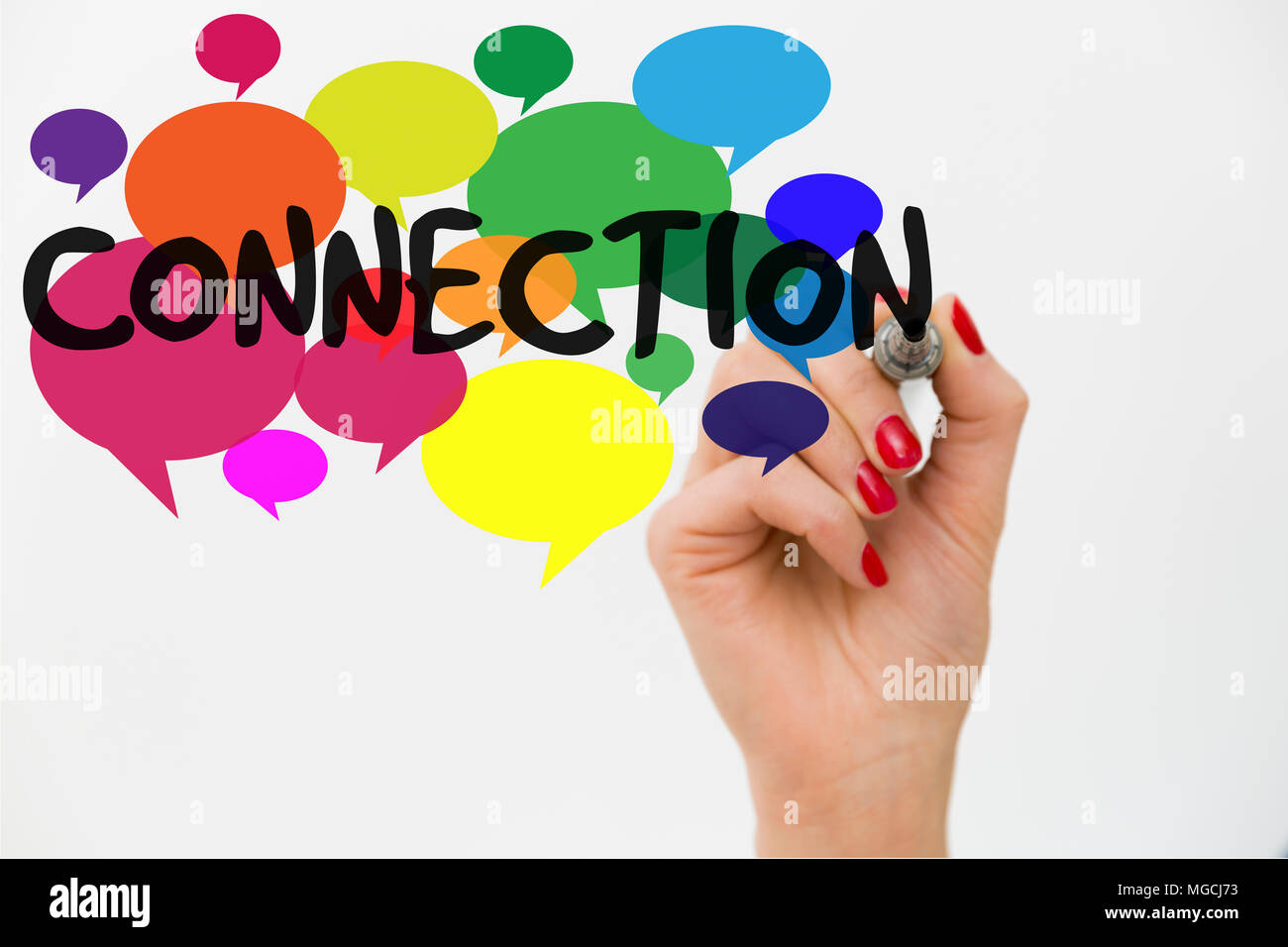 Woman's hand writing word connection on colorful conversation bubbles ...
