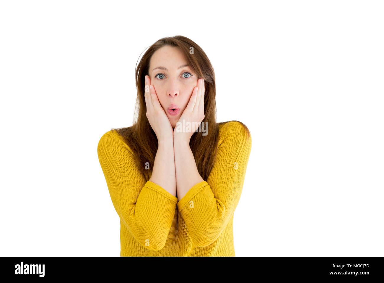 Surprised young woman on isolated white background Stock Photo - Alamy