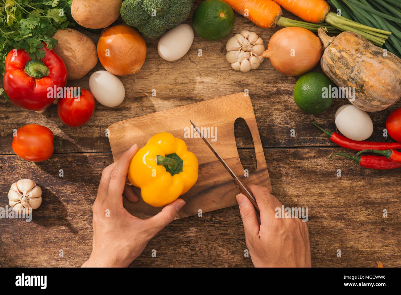 Cutting cook hands man male knife preparation fresh vegetables salad in ...