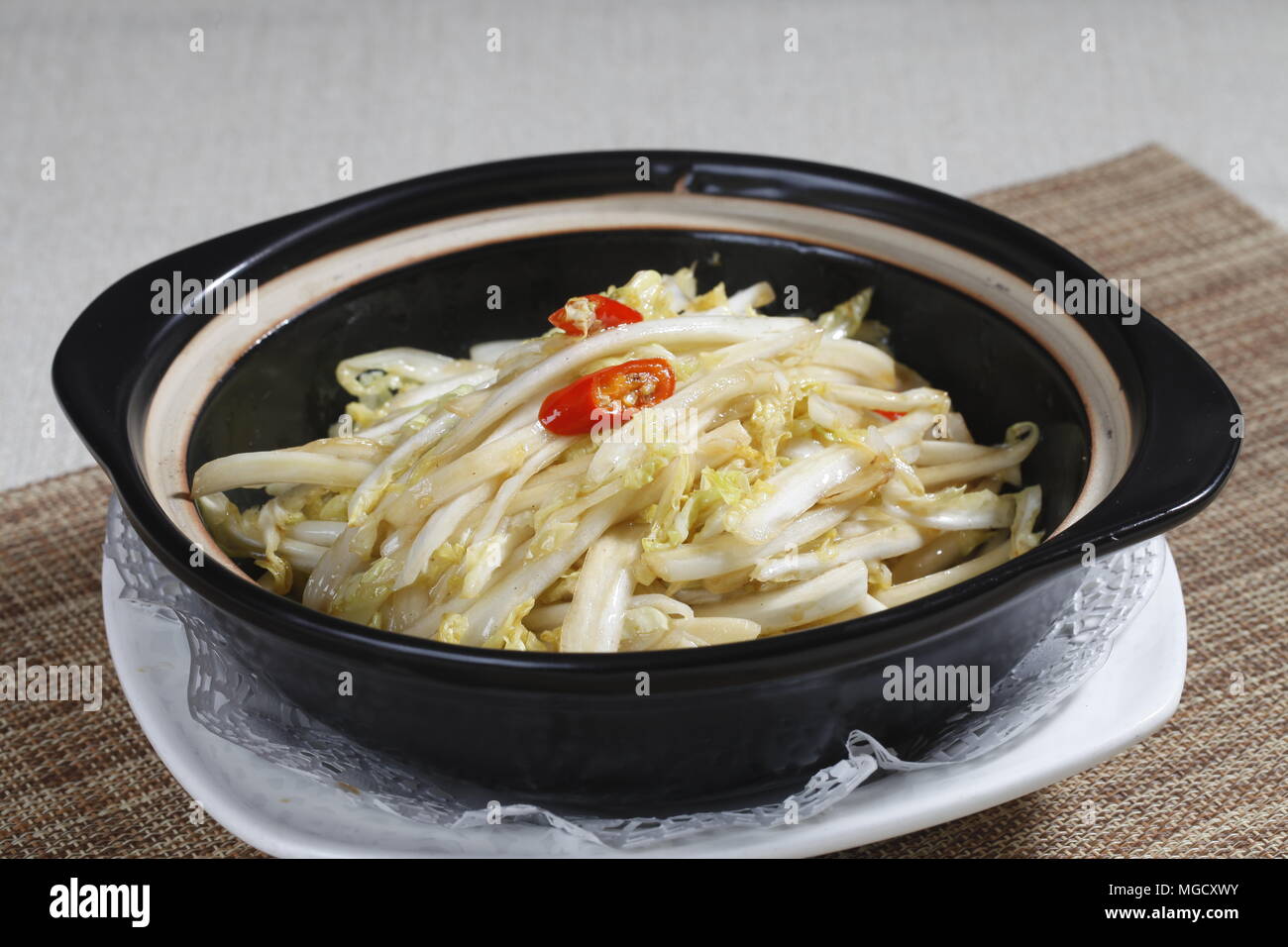 Fried baby cabbage Stock Photo - Alamy