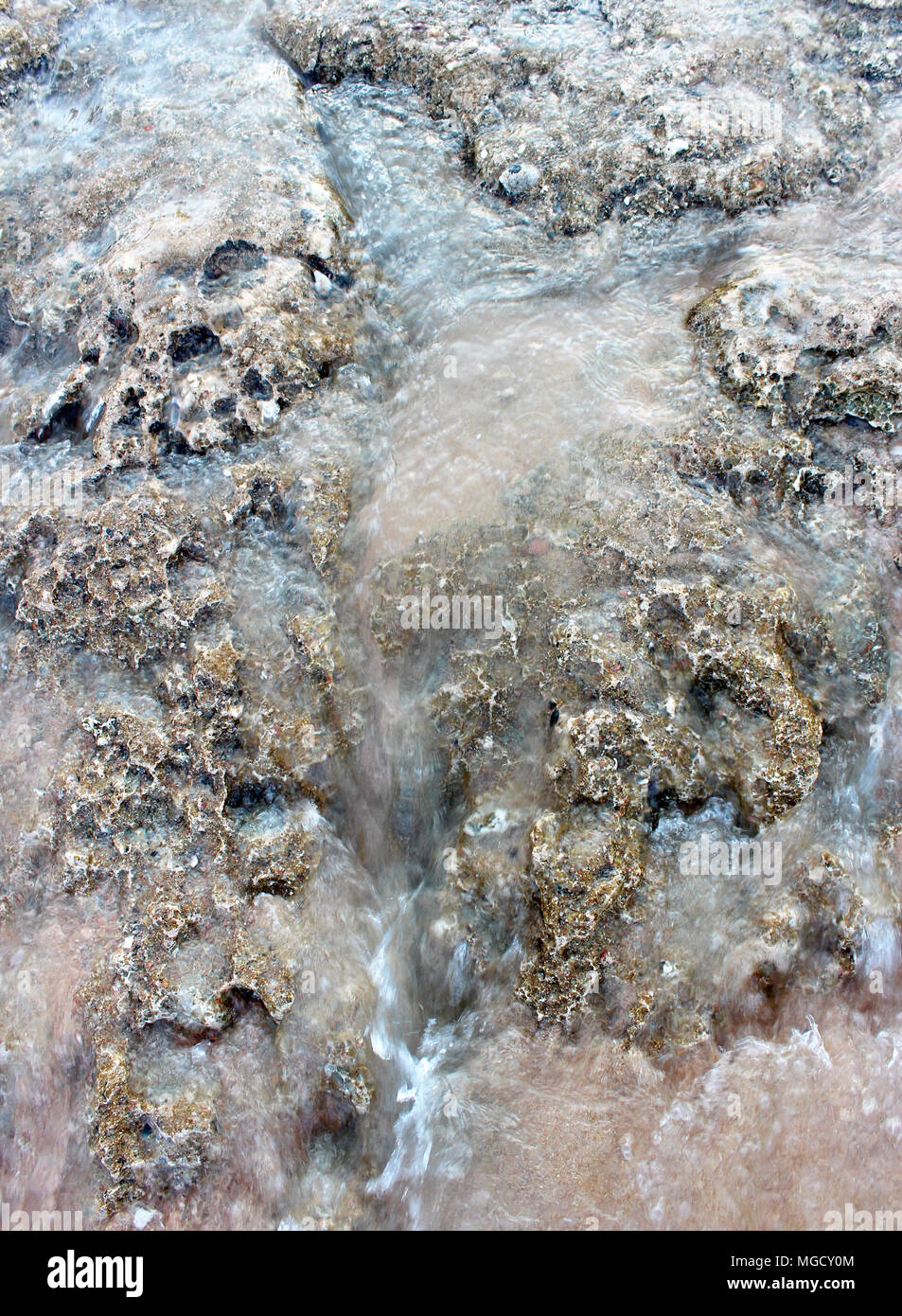 Water flows down the stream on a stone Stock Photo - Alamy