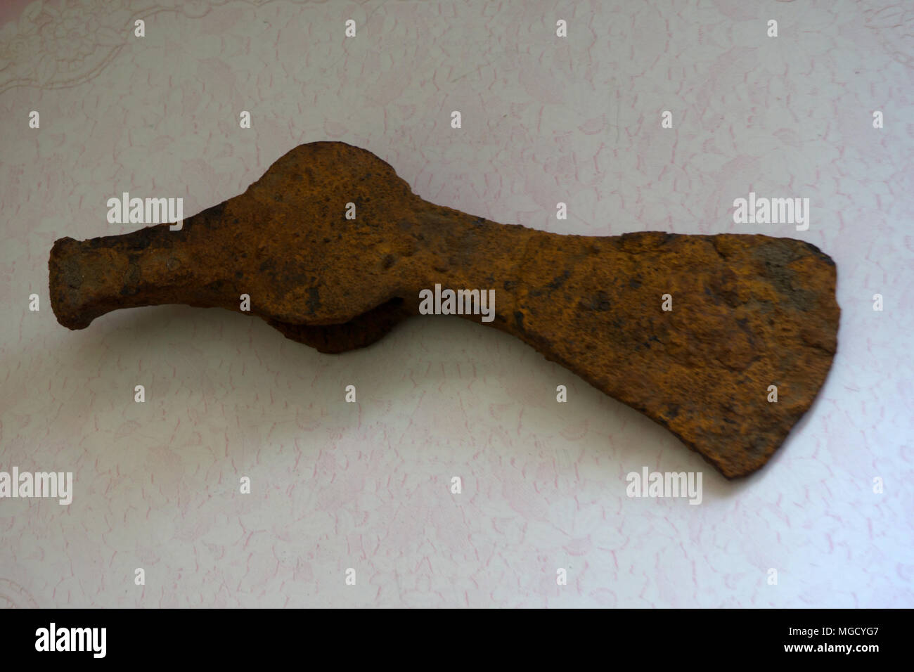 early bronze age axe head - metal detecting find Stock Photo - Alamy