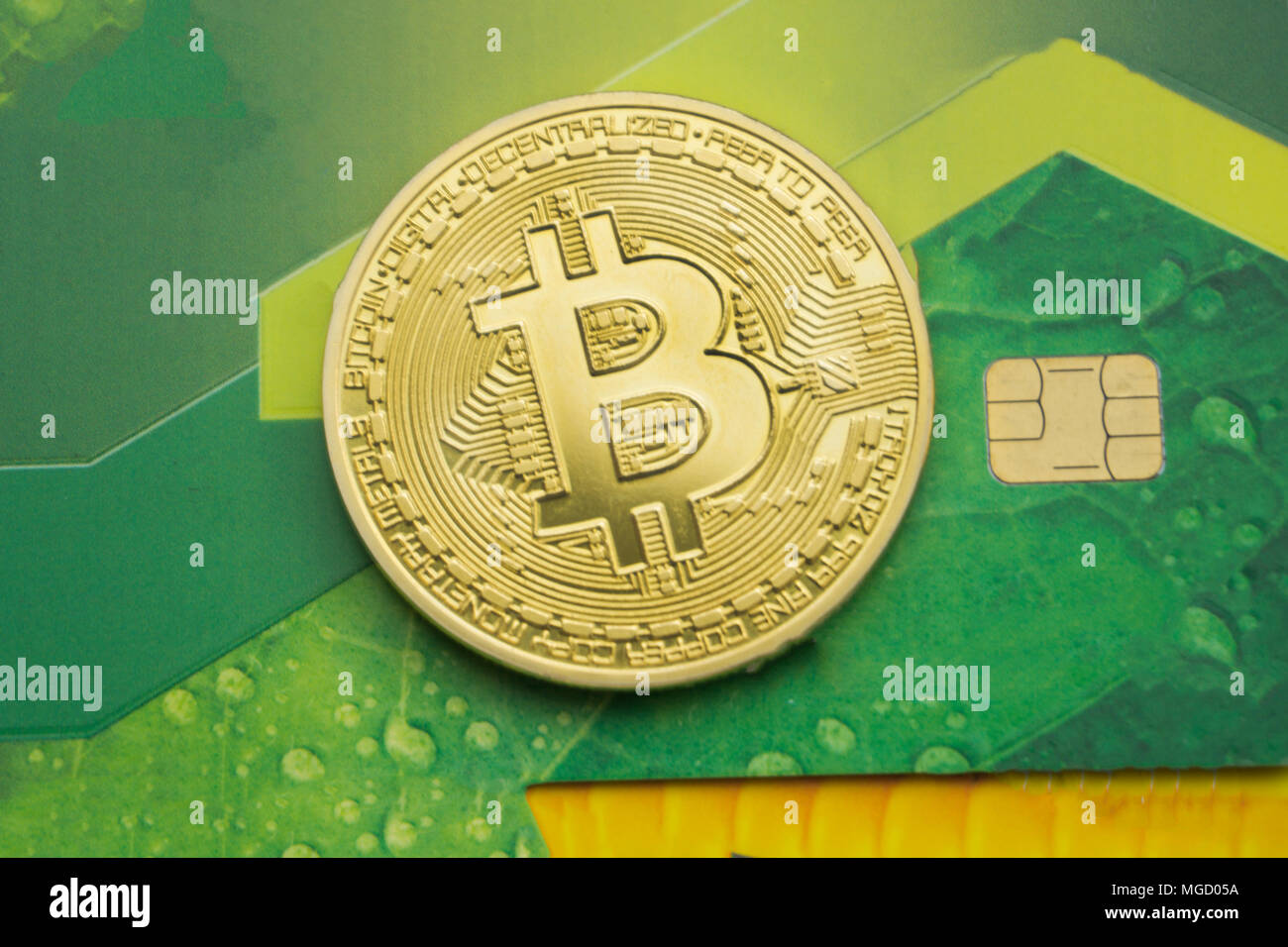 bitcoin and green credit card Stock Photo - Alamy