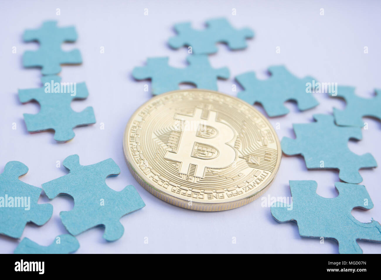 gold bitcoin and puzzles Stock Photo - Alamy