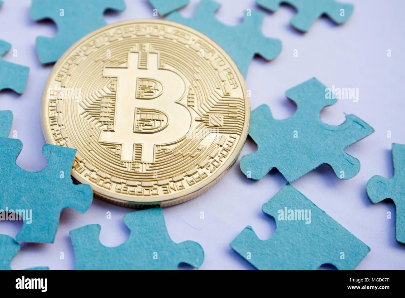 gold bitcoin and puzzles Stock Photo - Alamy