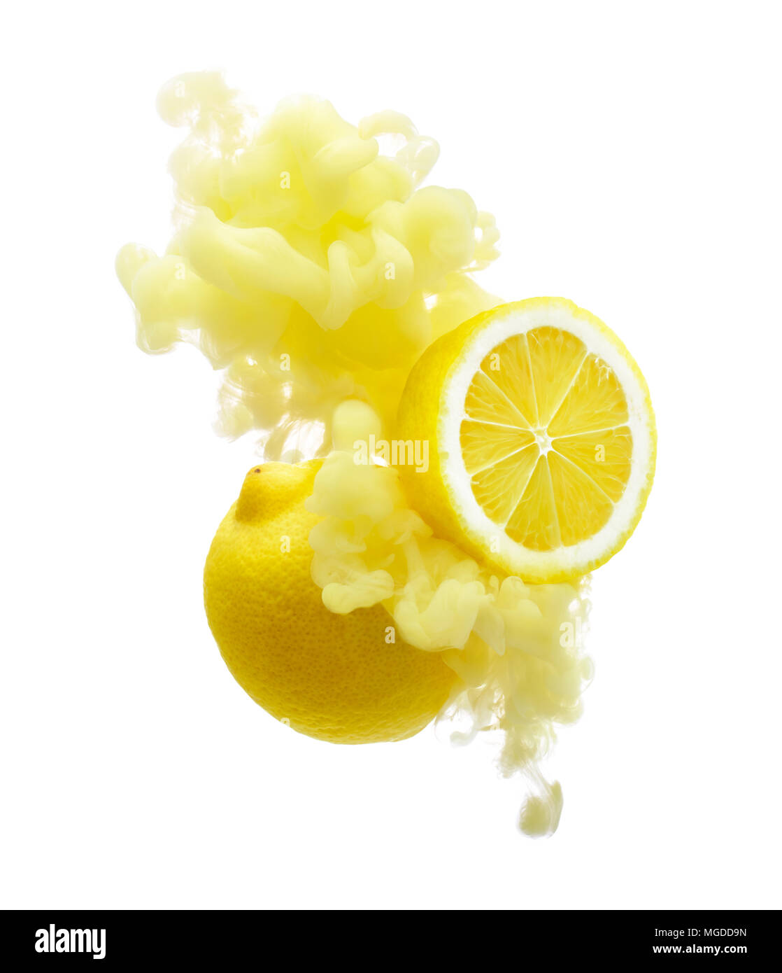 Lemon on ink isolated over white background Stock Photo - Alamy