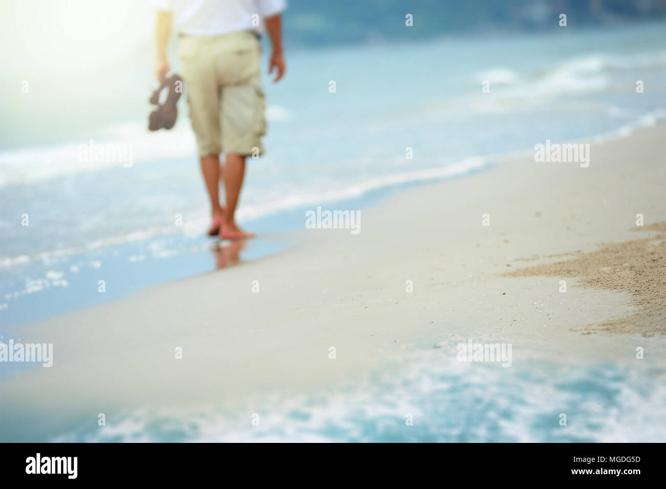 Blurred people walk on beach hi-res stock photography and images - Alamy