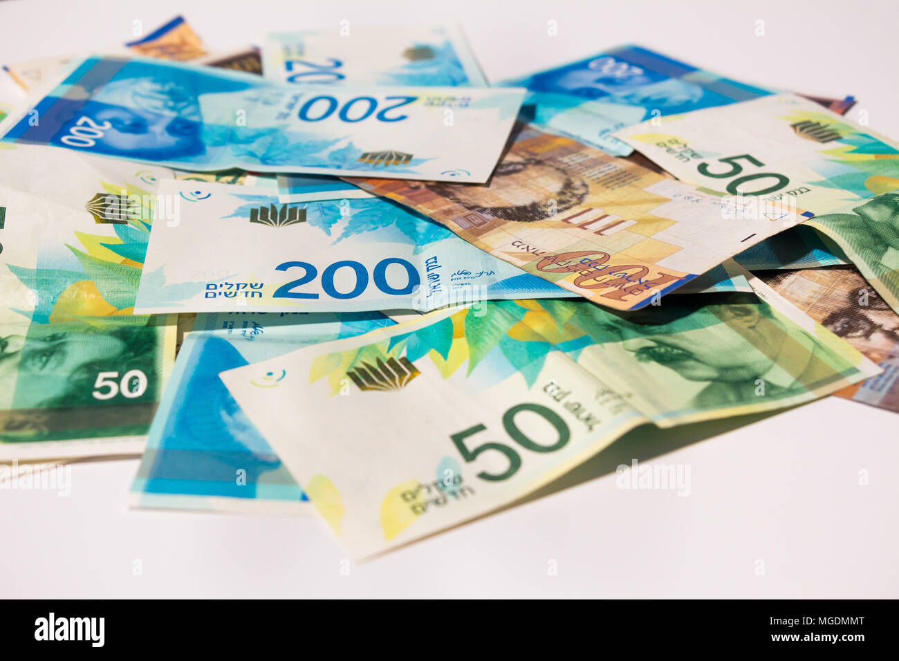 Stack of various of israeli shekel money bills Stock Photo - Alamy