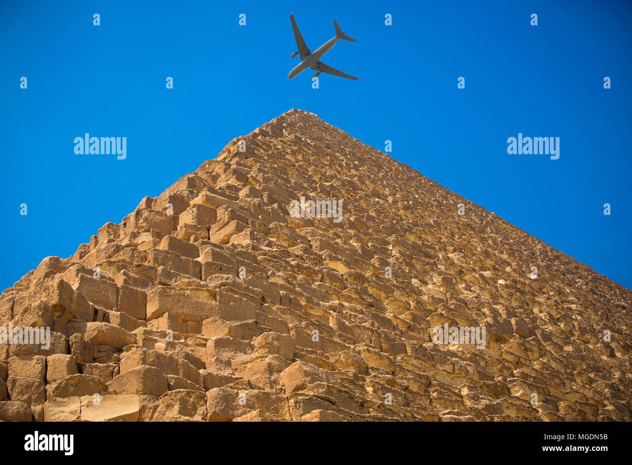 tourist plane flies over the pyramids of Cairo Egypt Stock Photo - Alamy