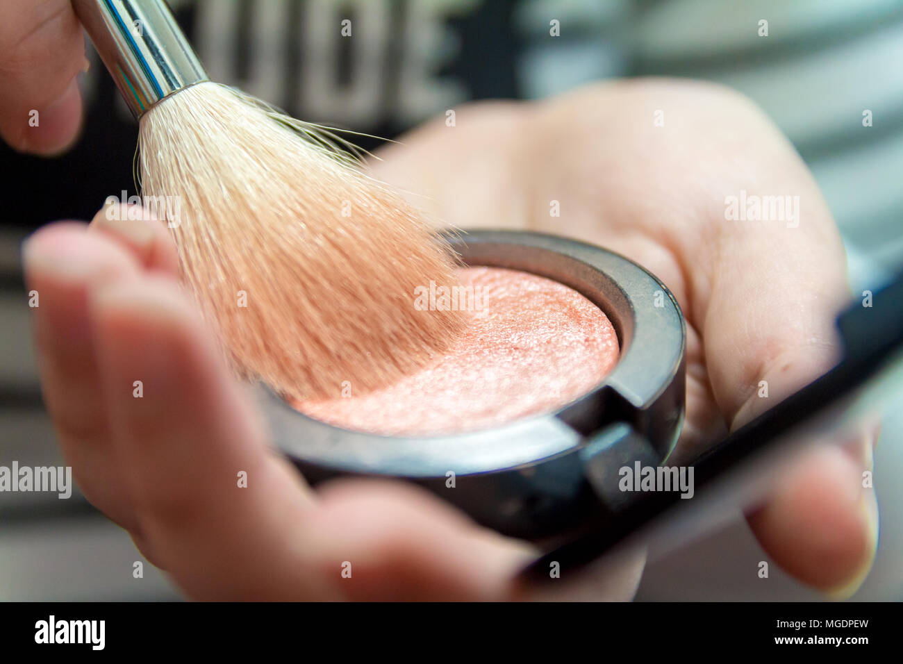 Close up of woman hands holding makeup brush and blush box Stock Photo ...