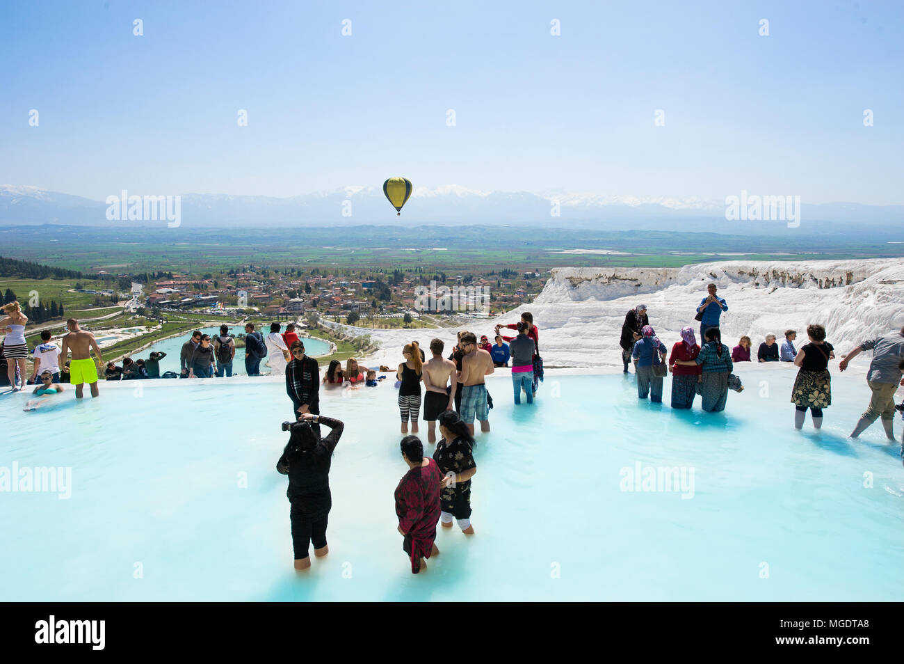 PAMUKKALE, TURKEY - APRIL 12, 2015: Turquoise water travertine pool ...