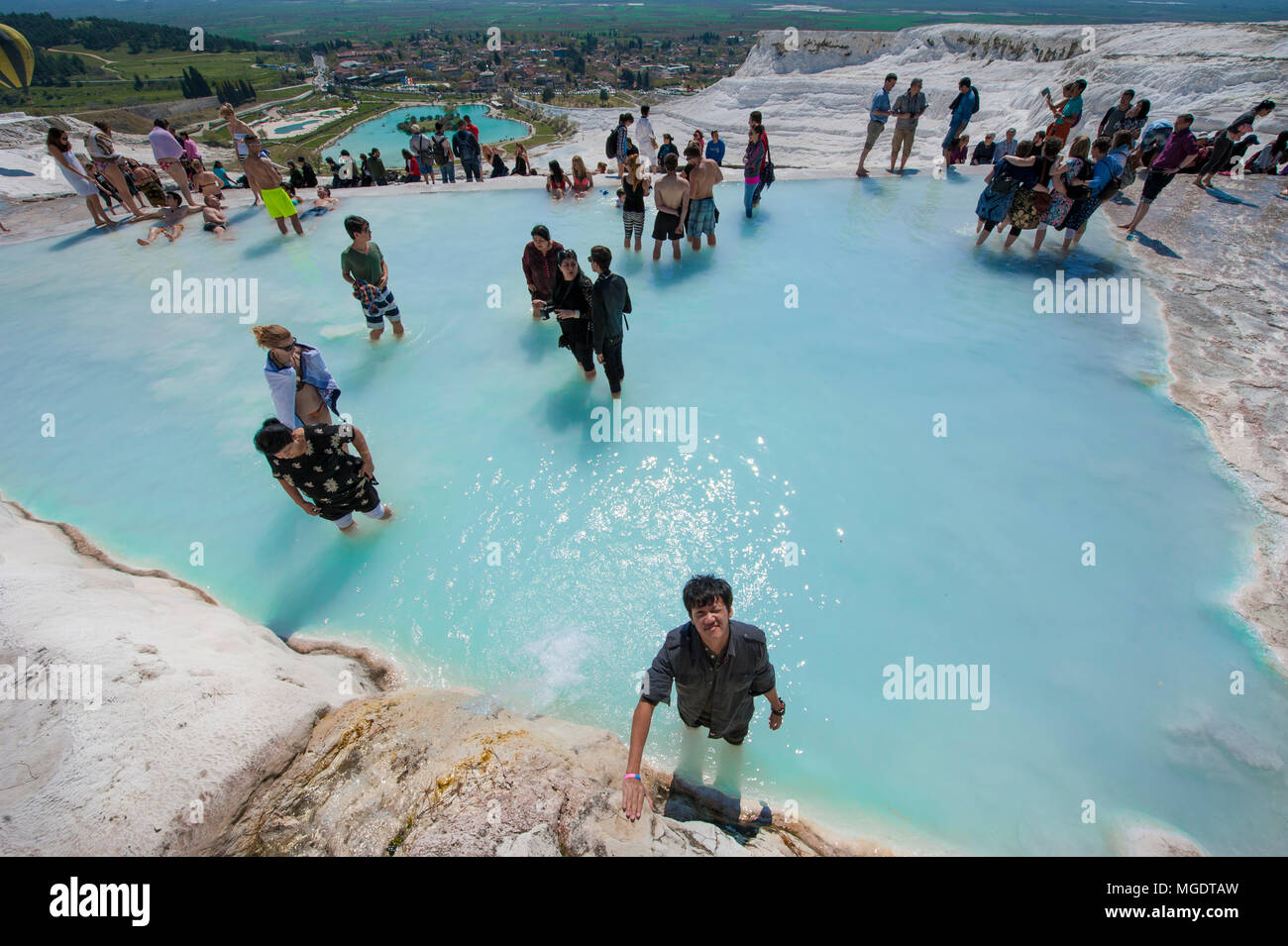 PAMUKKALE, TURKEY - APRIL 12, 2015: Turquoise water travertine pool ...