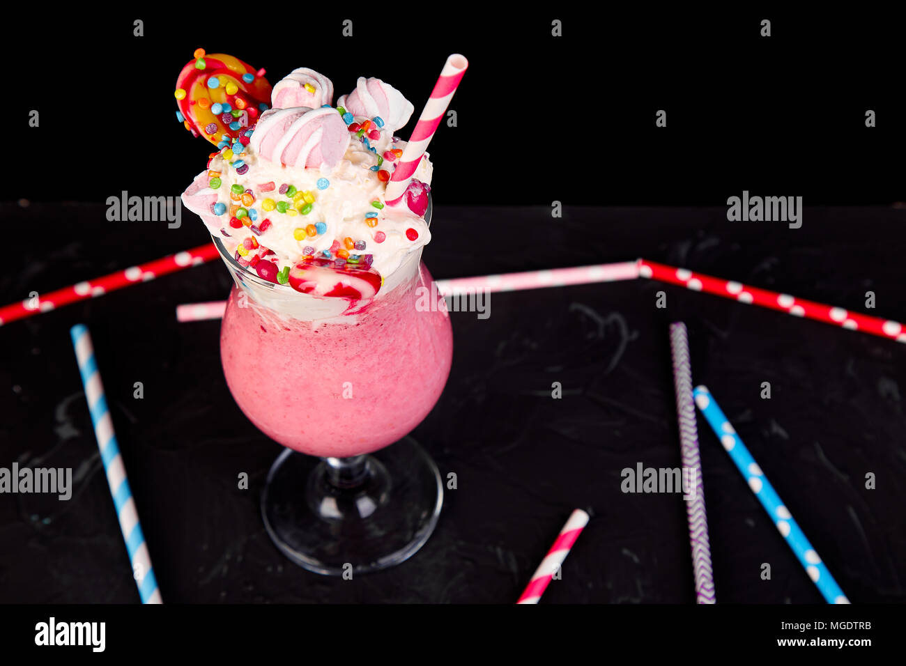 Pink Extreme milkshake with berry, rasberry, strawberry, candy ...
