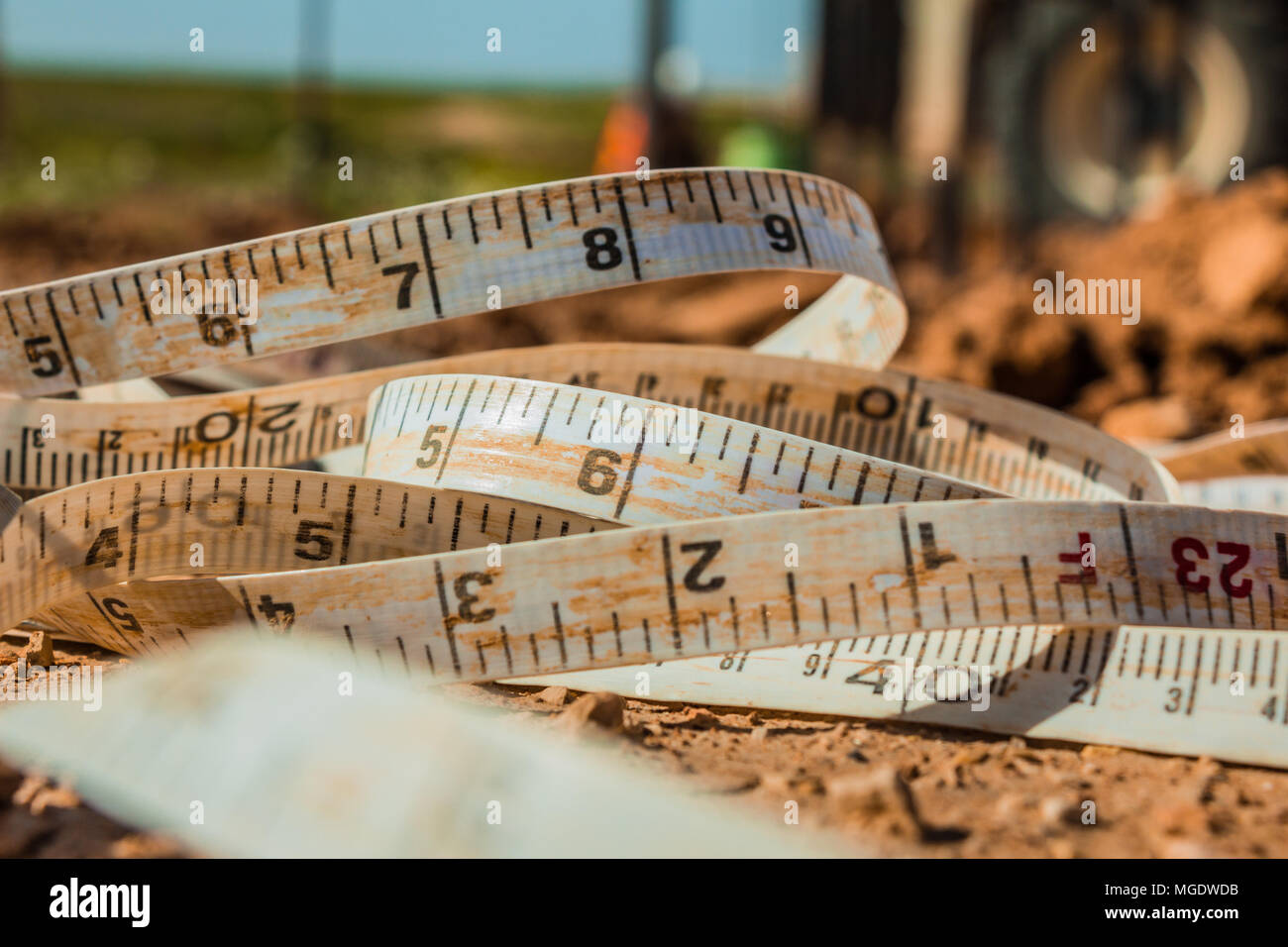 Measuring tape placed on the ground at a construction site Stock Photo ...