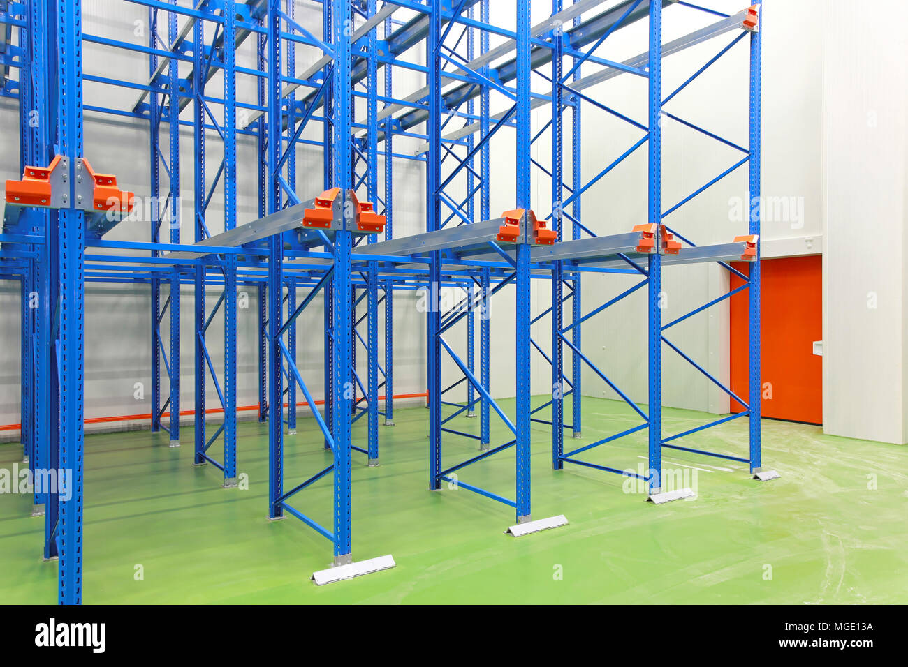 Empty shelves in new distribution warehouse Stock Photo - Alamy