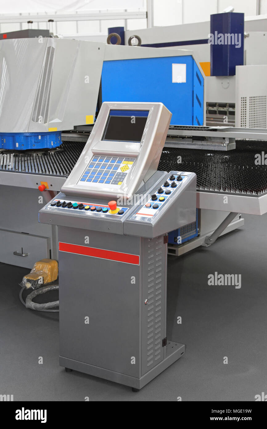 Automated turret punch press machine in factory Stock Photo - Alamy