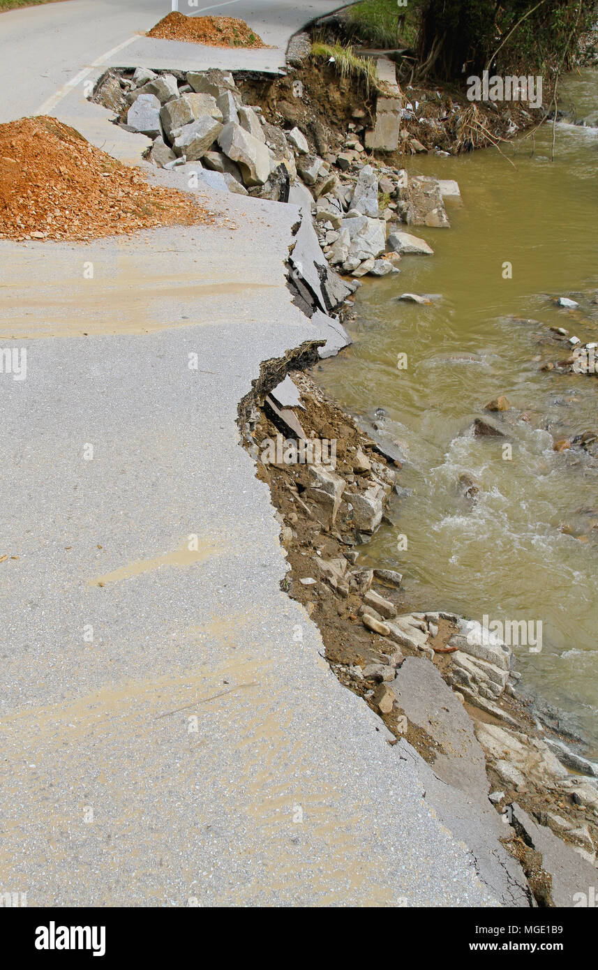 Dangerous side of local road destroyed by erosion Stock Photo - Alamy