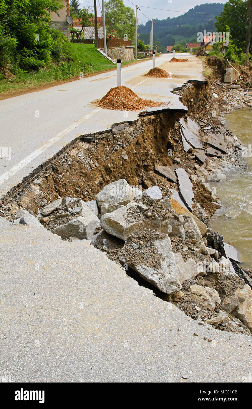 Destroyed road landslide damaged in powerful flood Stock Photo - Alamy
