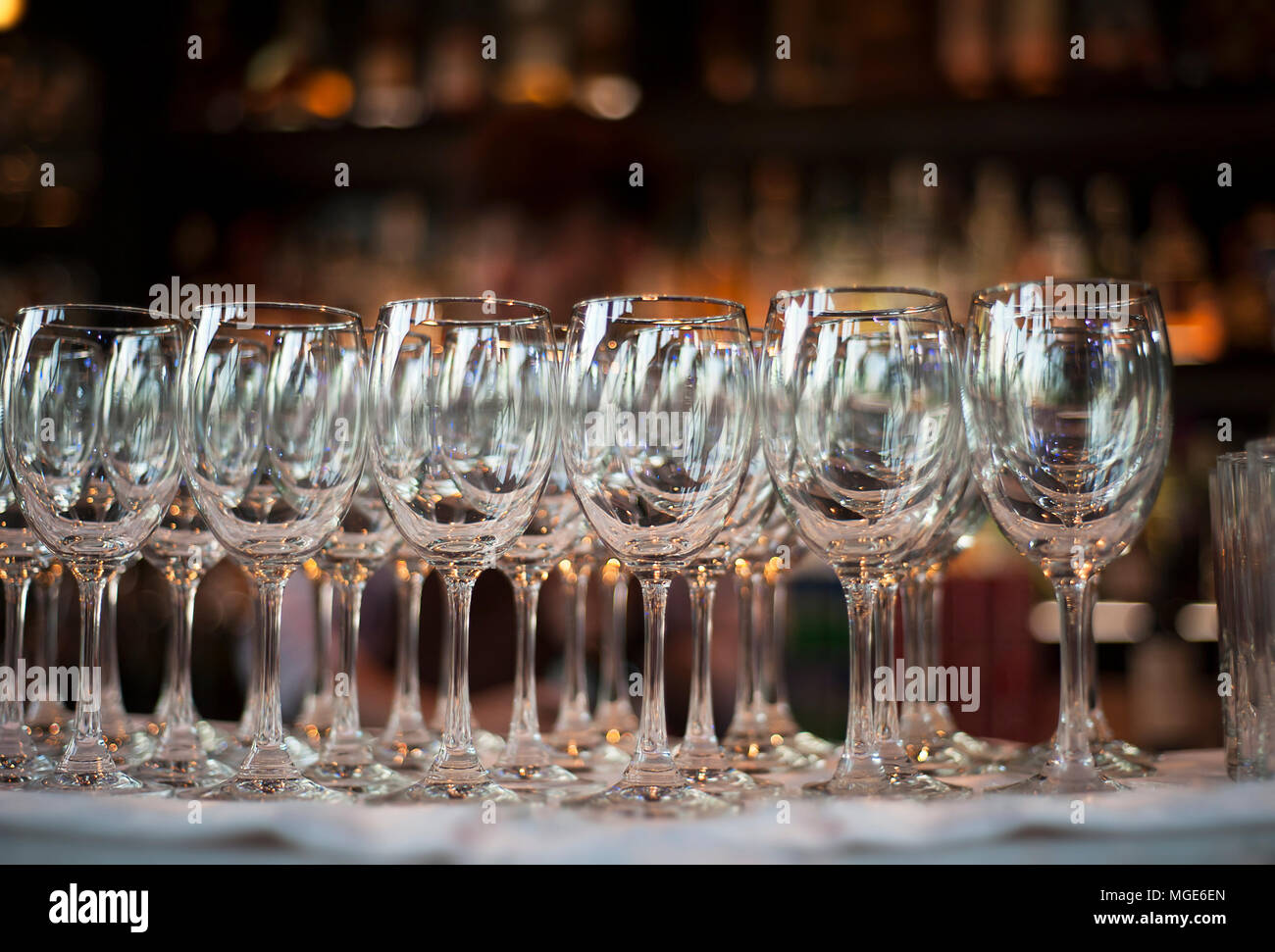 Row clear wine glasses on hi-res stock photography and images - Alamy